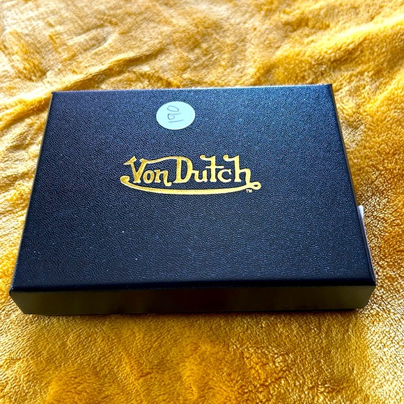 Von Dutch | Bags | Von Dutch Black And Gold Wallet | Poshmark